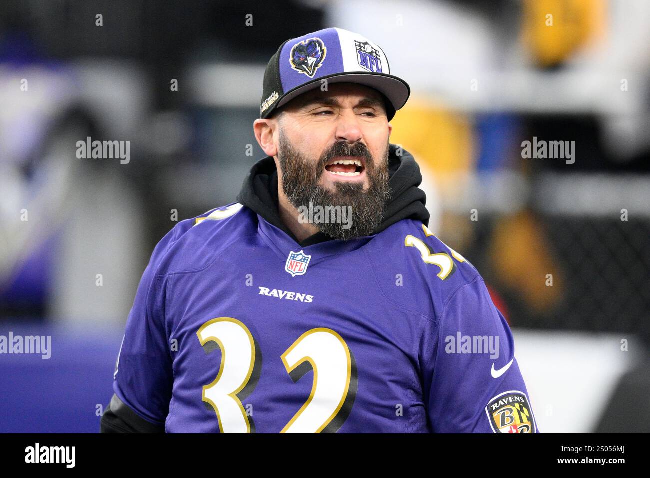 Former Baltimore Raven Eric Weddle reacts before an NFL football game ...