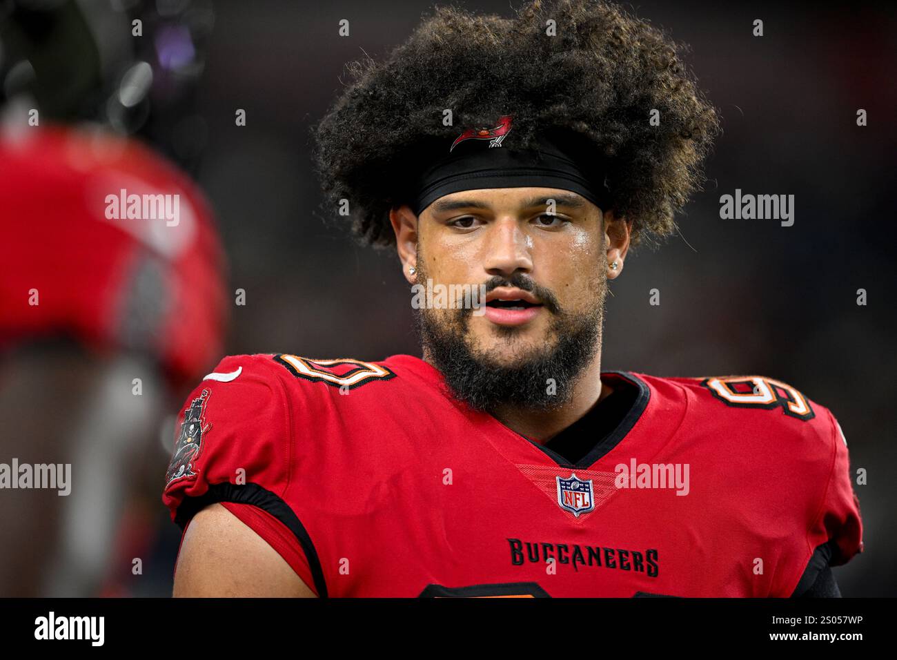 Tampa Bay Buccaneers defensive end Logan Hall warms up before an NFL ...