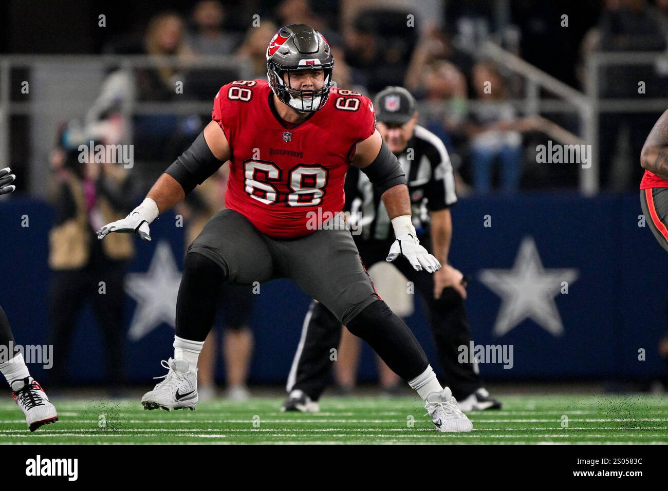 Tampa Bay Buccaneers guard Ben Bredeson (68) drops into pass coverage ...