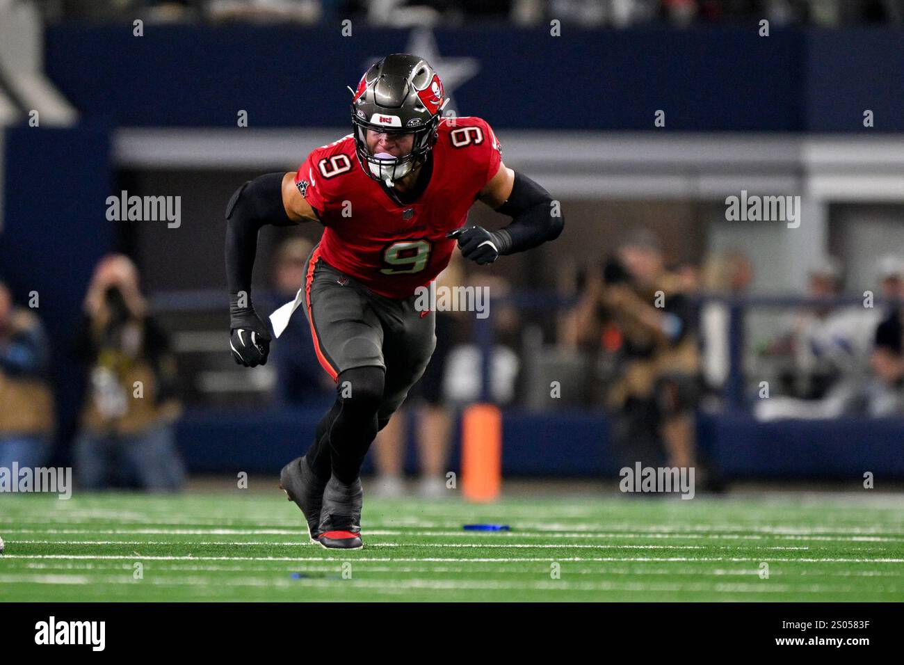 Tampa Bay Buccaneers linebacker Joe Tryon-Shoyinka (9) rushes during an ...