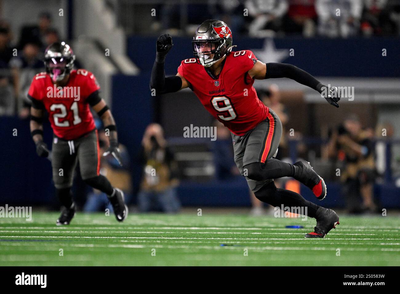Tampa Bay Buccaneers linebacker Joe Tryon-Shoyinka (9) rushes during an ...