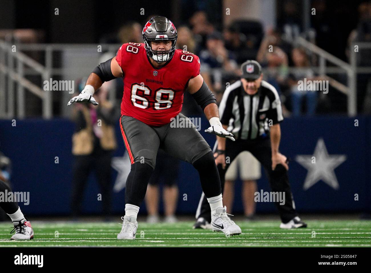 Tampa Bay Buccaneers guard Ben Bredeson (68) drops into pass coverage ...