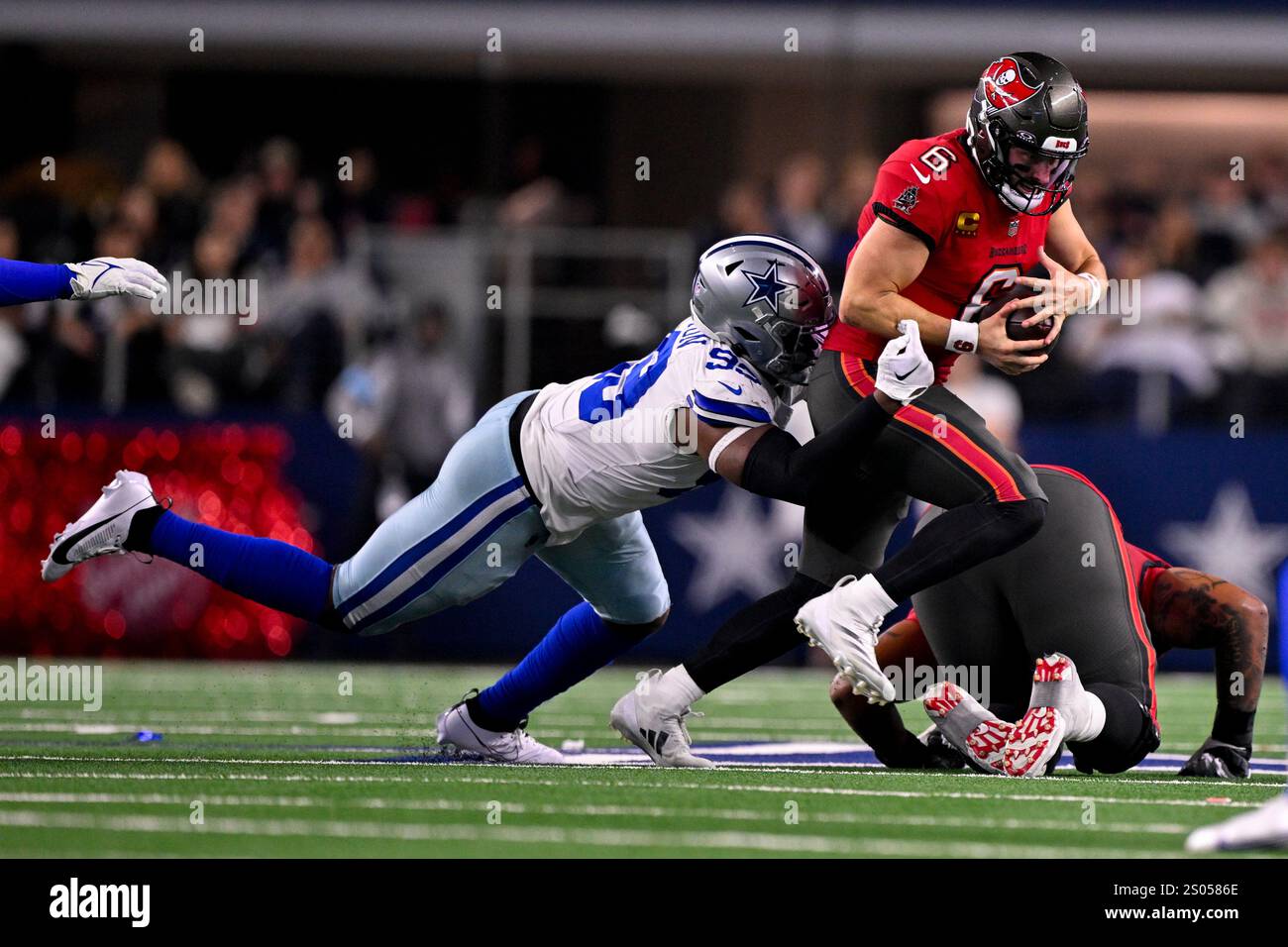 Tampa Bay Buccaneers quarterback Baker Mayfield (6) is sacked by Dallas ...