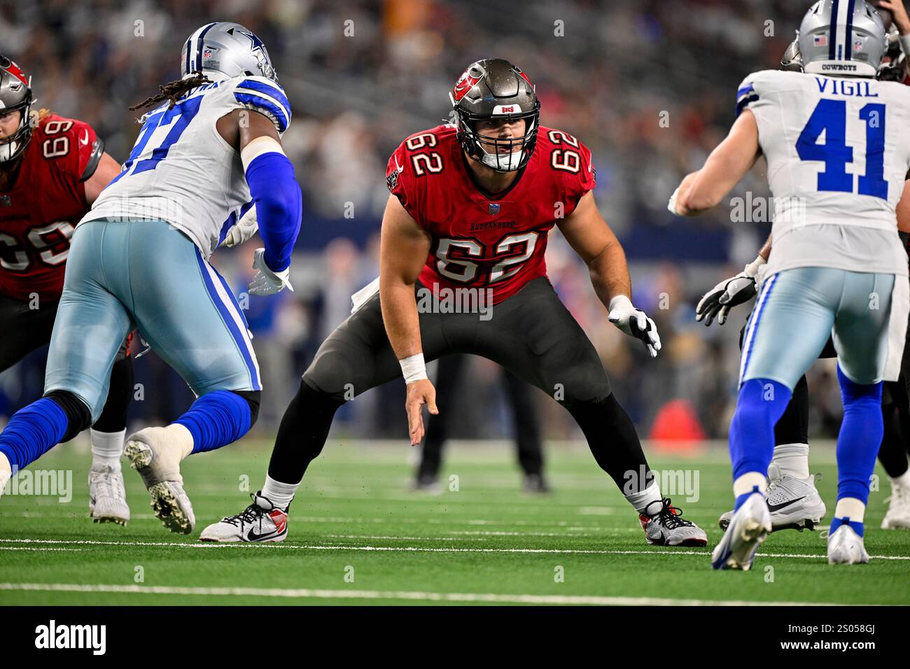Tampa Bay Buccaneers center Graham Barton (62) blocks the rush of ...