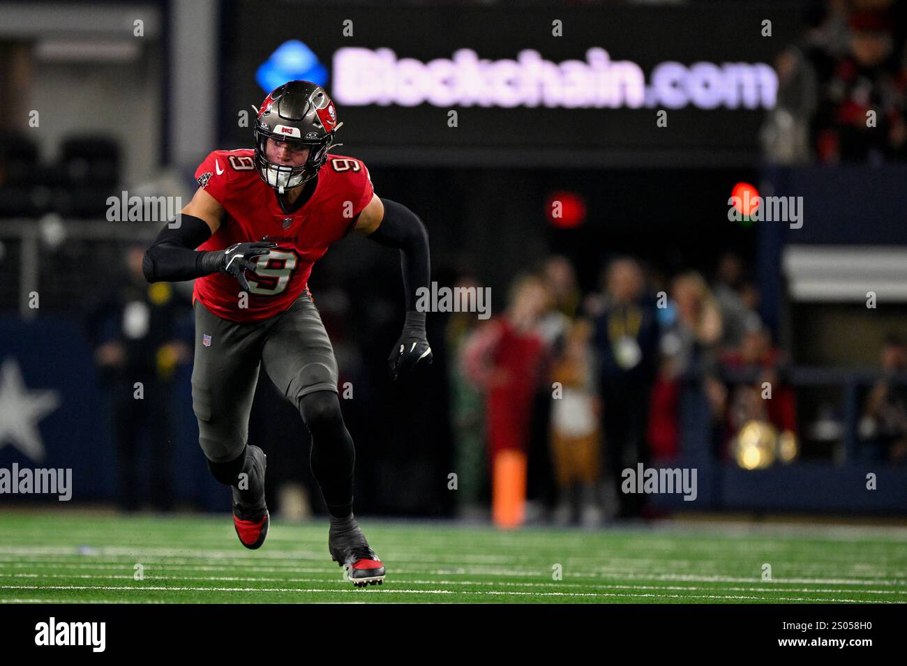 Tampa Bay Buccaneers linebacker Joe Tryon-Shoyinka (9) rushes the line ...