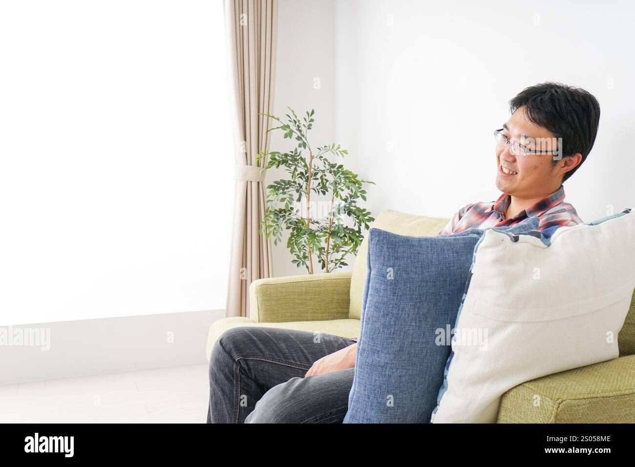 Man living alone or working alone Stock Photo - Alamy