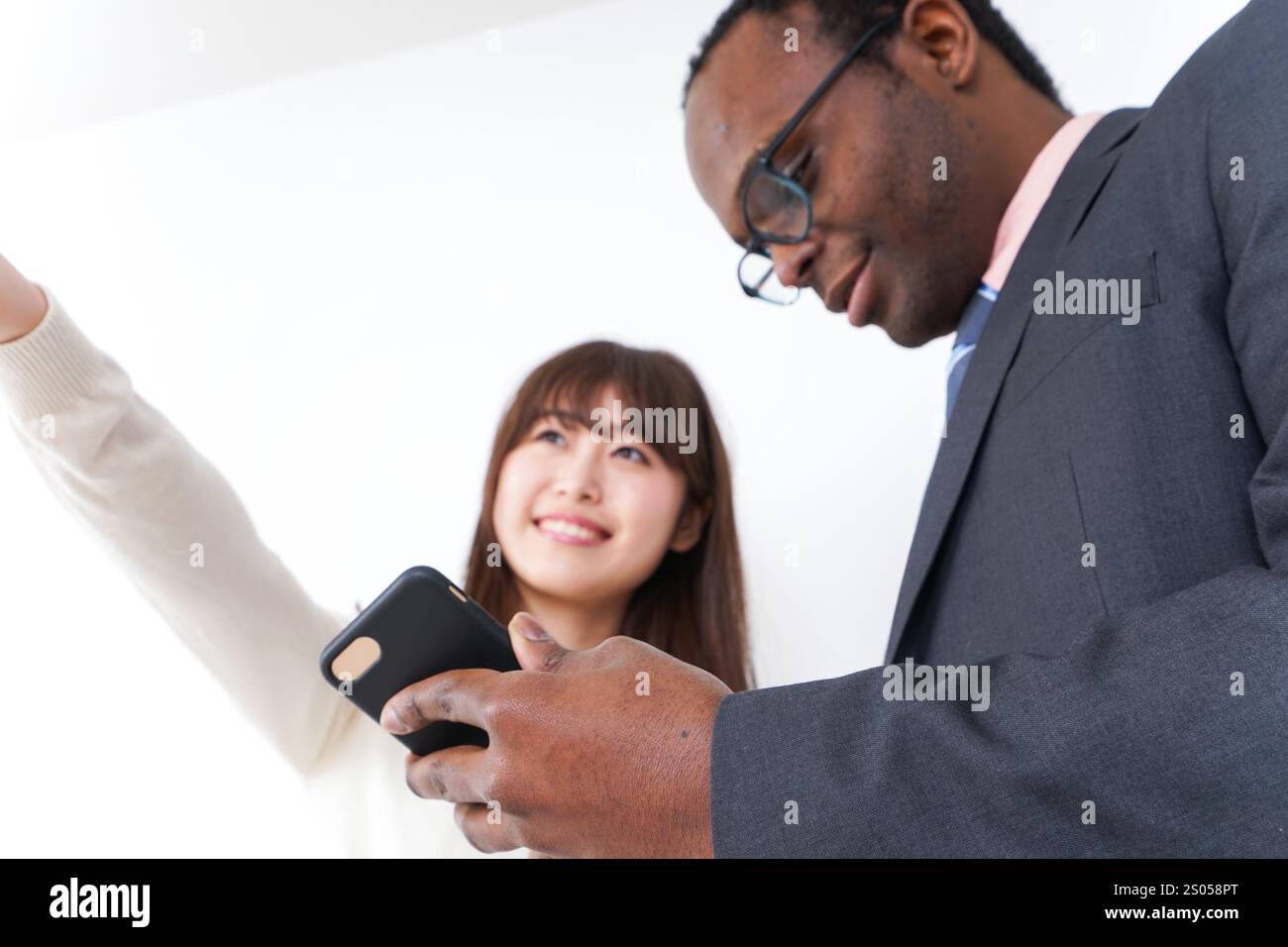 Young woman giving directions to a foreigner Stock Photo - Alamy