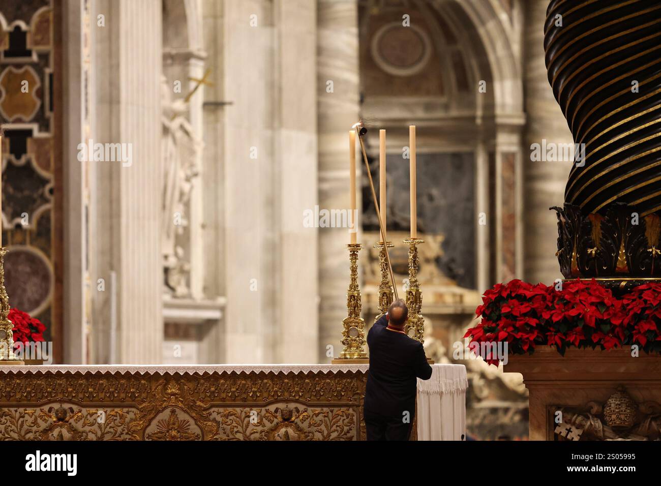 Rome, Italy. 24th Dec, 2024. Candles are lit during the Christmas Eve ...