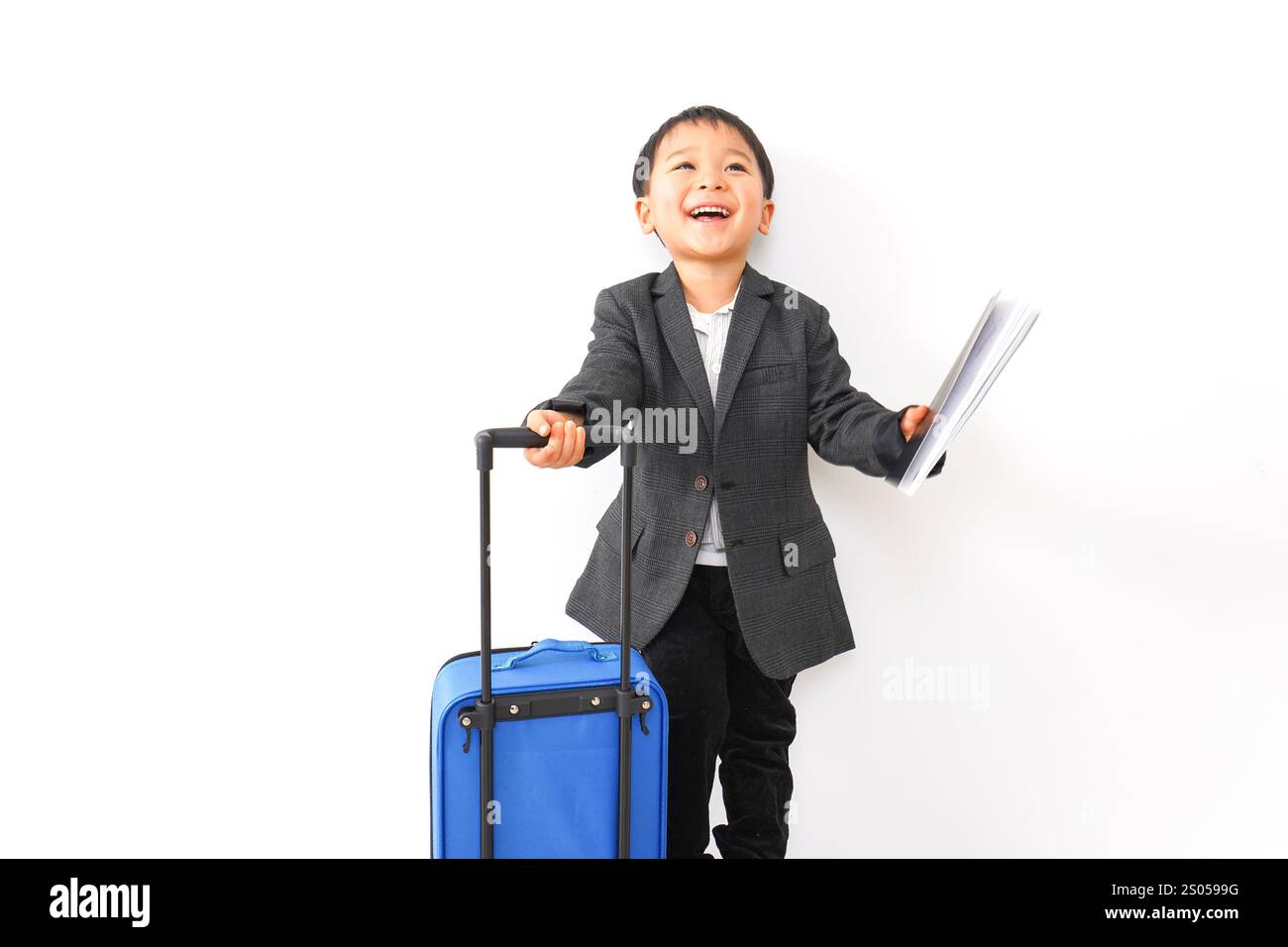 Child businessman working in suit Stock Photo - Alamy
