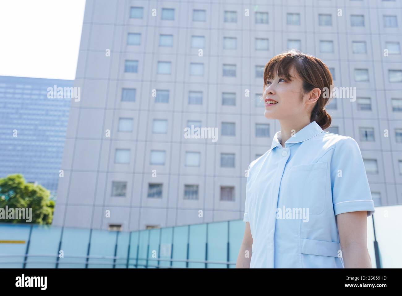 Nurse taking a break in hospital Stock Photo - Alamy
