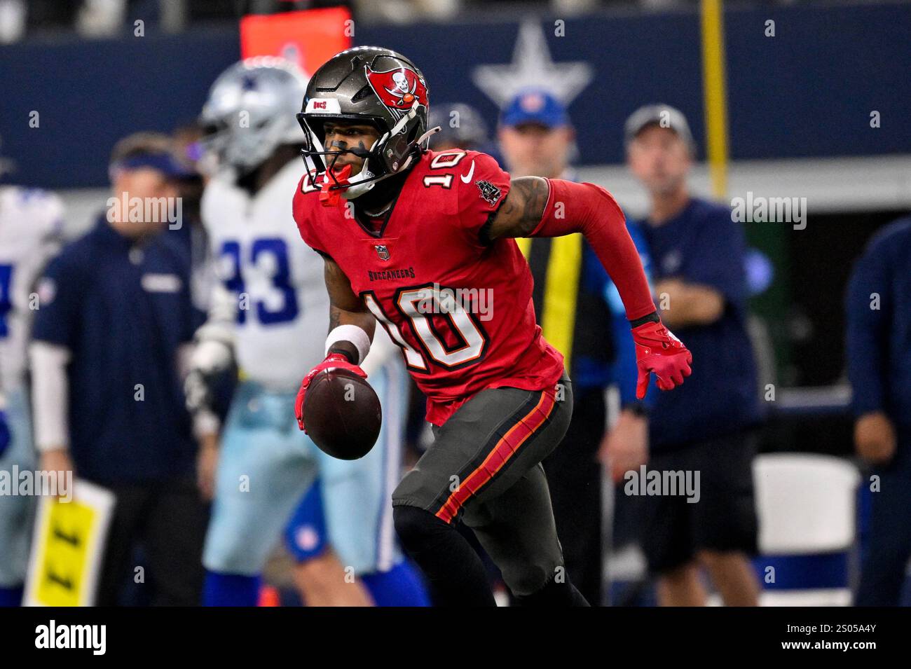 Tampa Bay Buccaneers wide receiver Trey Palmer (10) runs with the ball ...