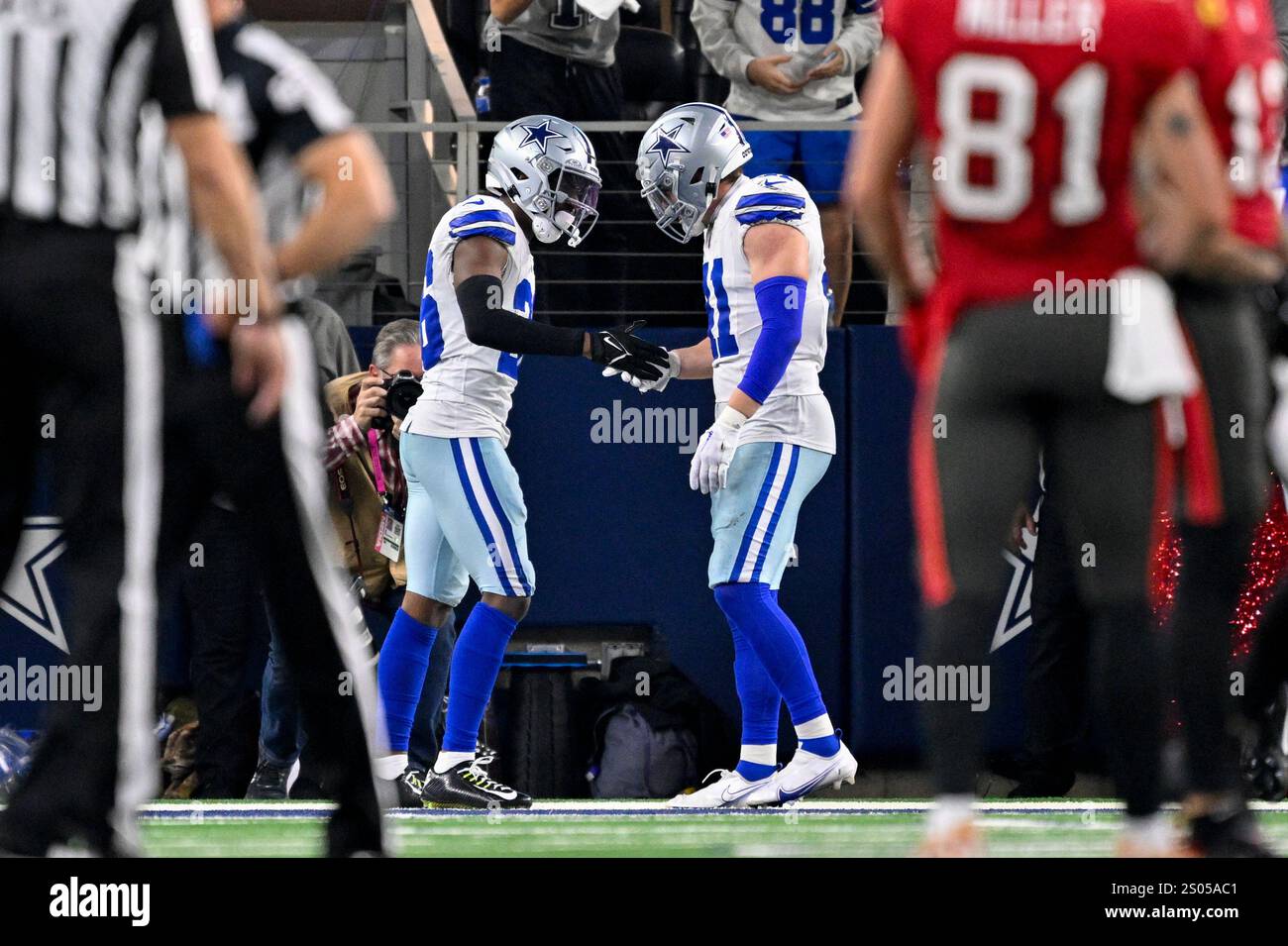 Dallas Cowboys cornerback DaRon Bland (26) and linebacker Nick Vigil ...
