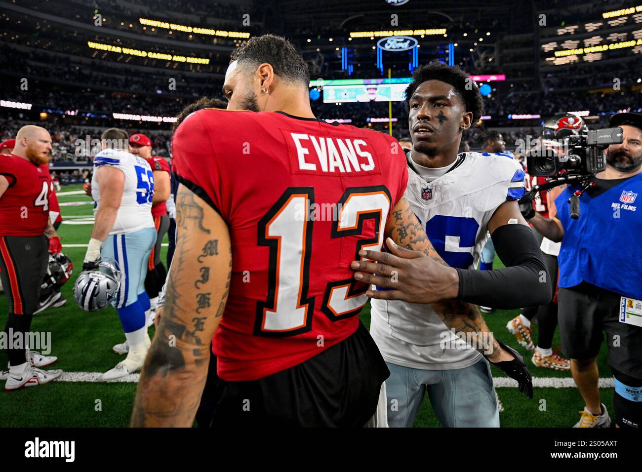 Tampa Bay Buccaneers wide receiver Mike Evans (13) talks with Dallas ...