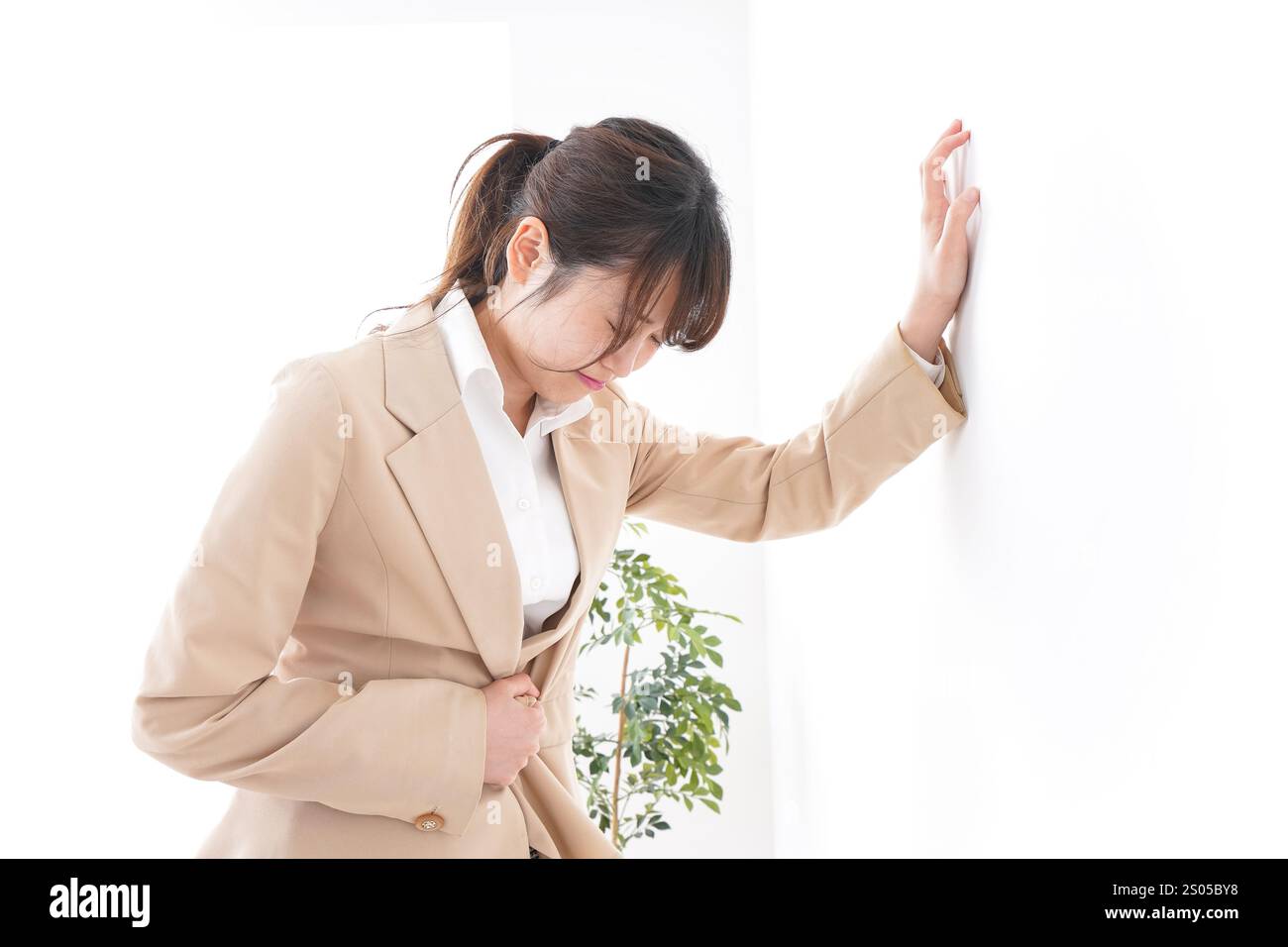 Stomach pain suffering person Cut Out Stock Images & Pictures - Alamy