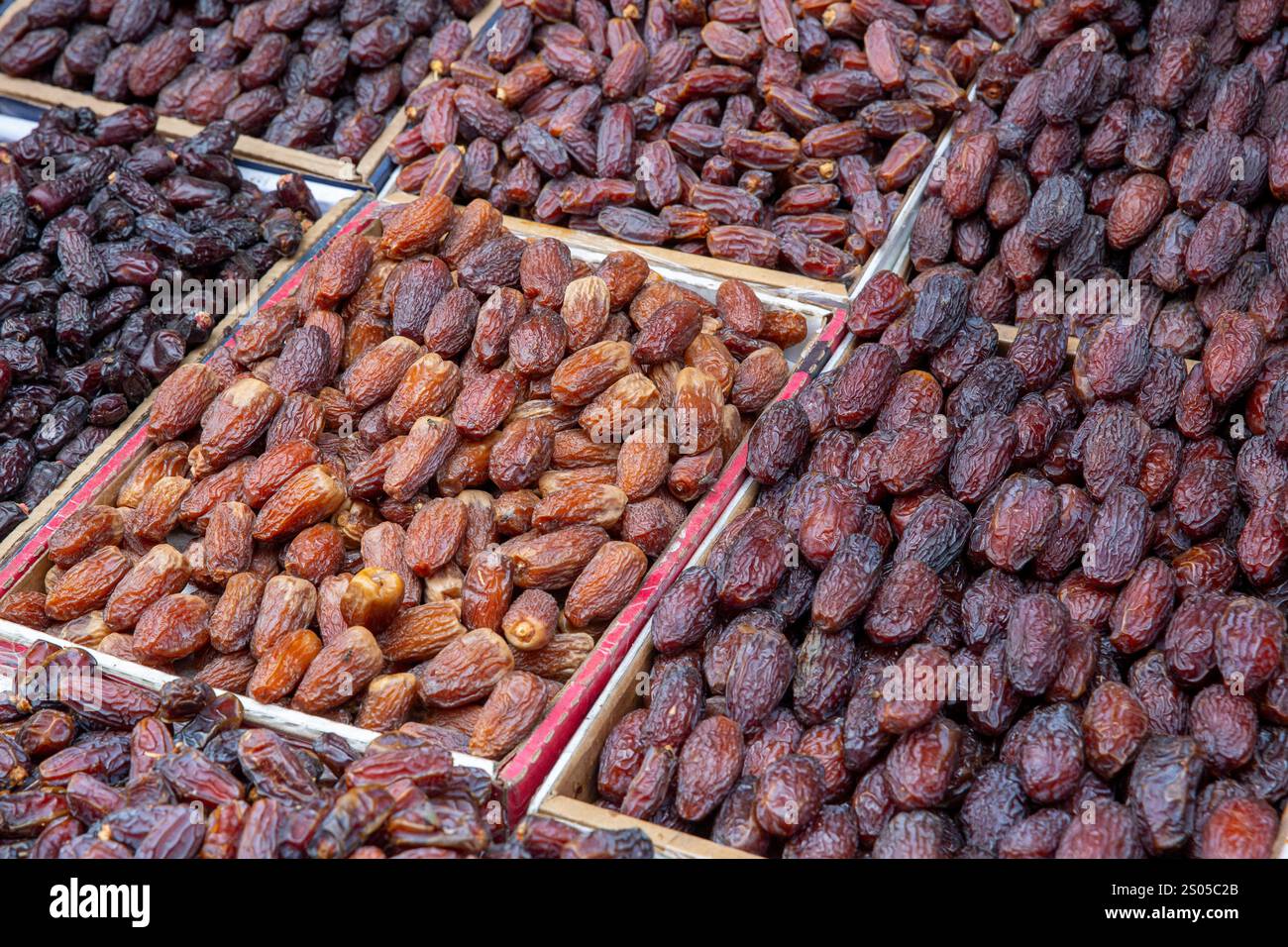 A variety of dates are beautifully displayed at a roadside shop in ...