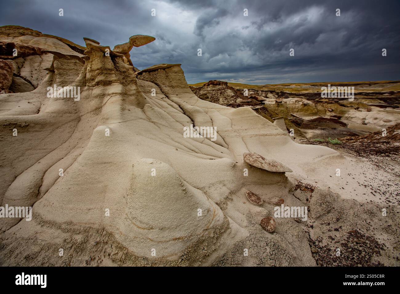 Sandstone caprocks on hoodoo rock formations in the badlands of the San ...