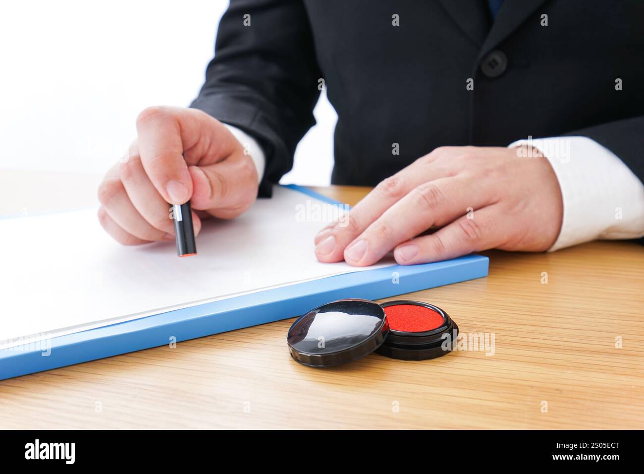Business person making a contract Stock Photo - Alamy