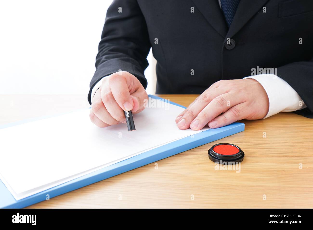 Business person making a contract Stock Photo - Alamy