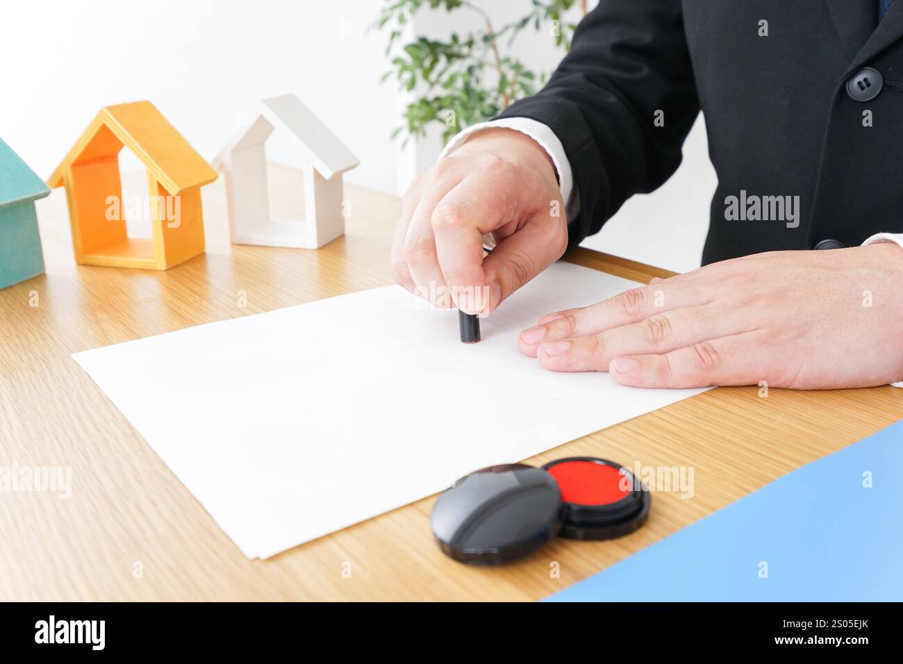 Business person making a contract Stock Photo - Alamy