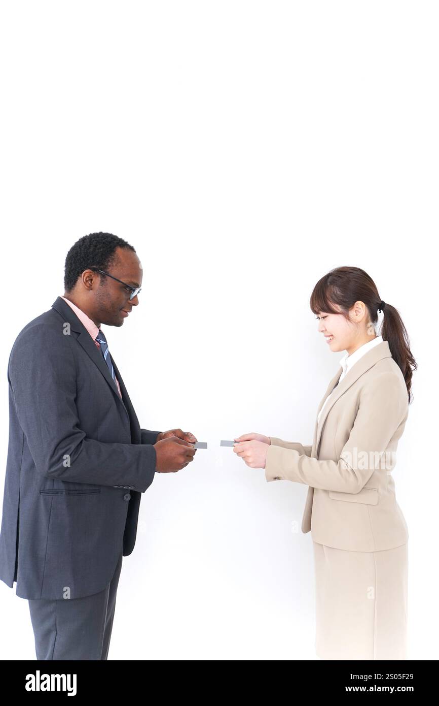 Business people interacting with each other Stock Photo - Alamy
