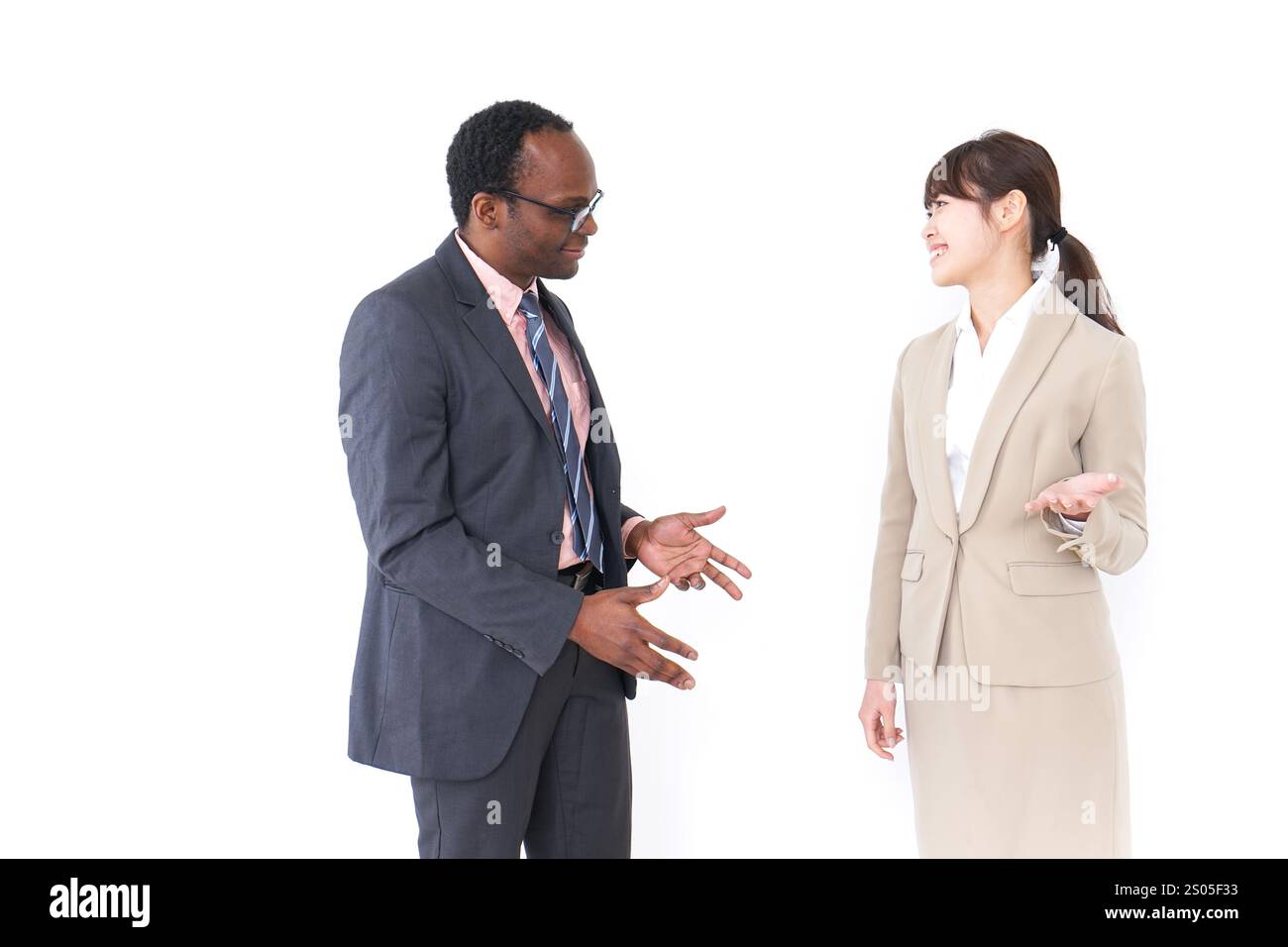 Business people interacting with each other Stock Photo - Alamy