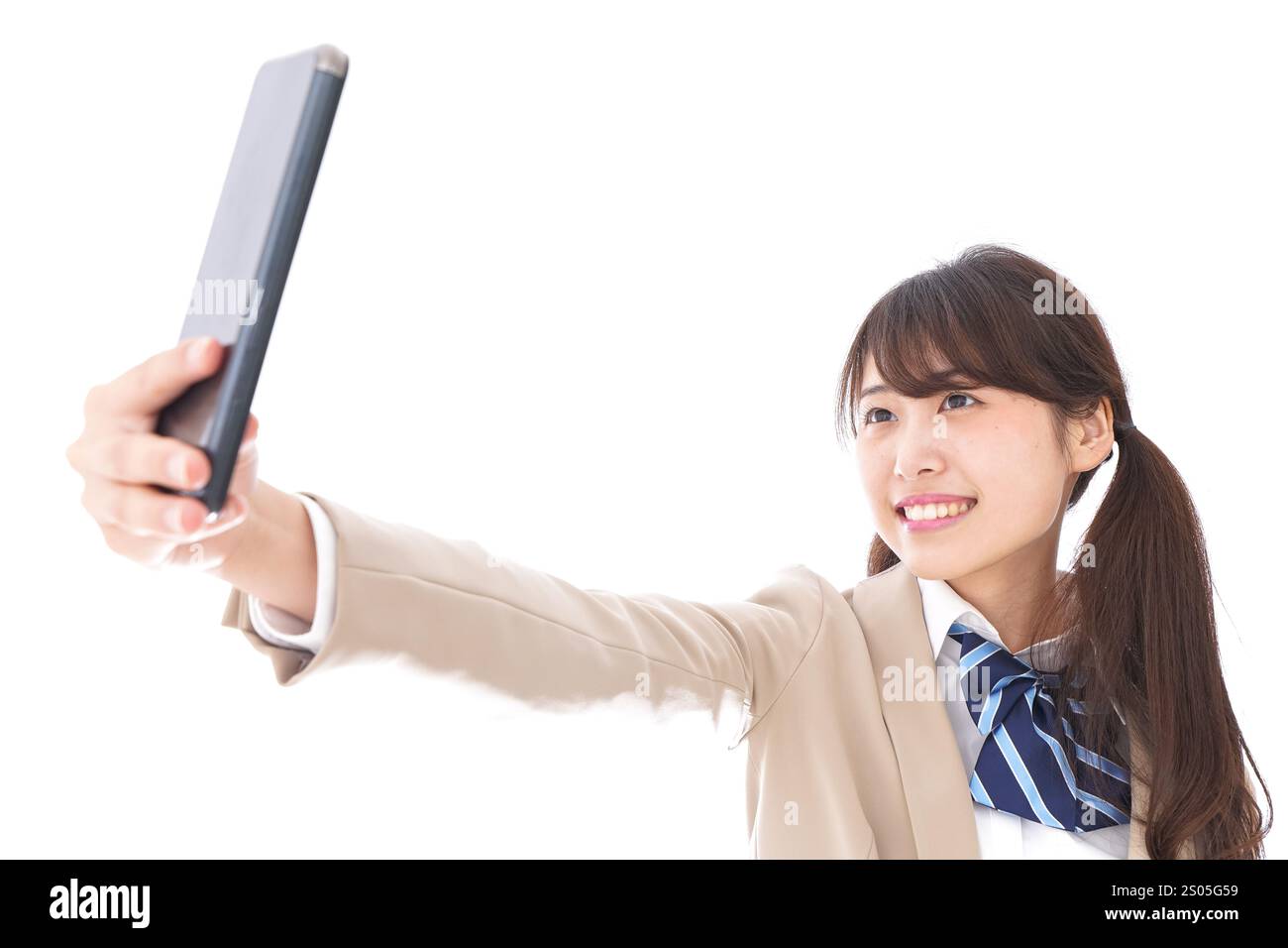 Student in school uniform taking a selfie Stock Photo - Alamy