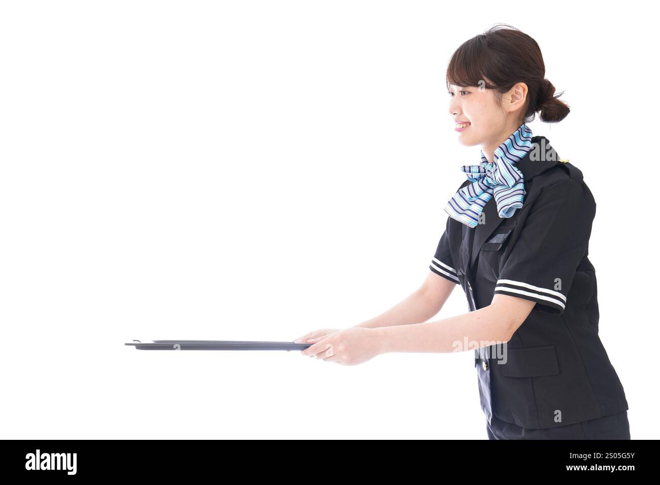 Cabin attendants performing in-flight service Stock Photo - Alamy