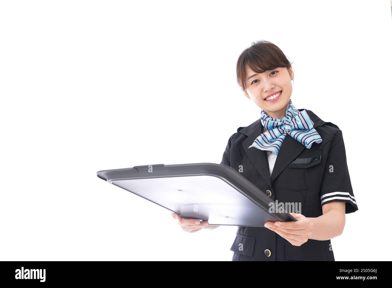 Cabin attendants performing in-flight service Stock Photo - Alamy