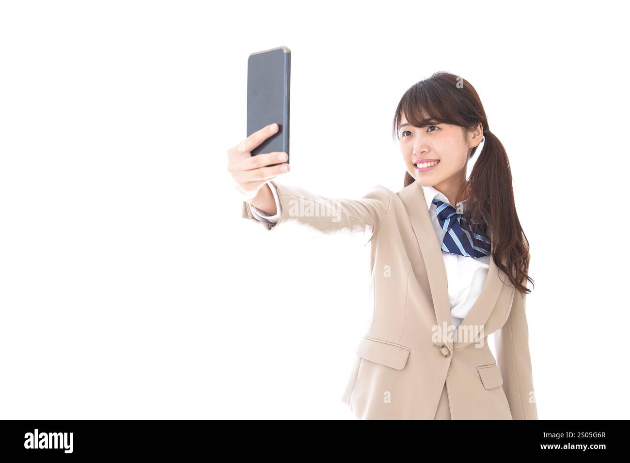 Student in school uniform taking a selfie Stock Photo - Alamy