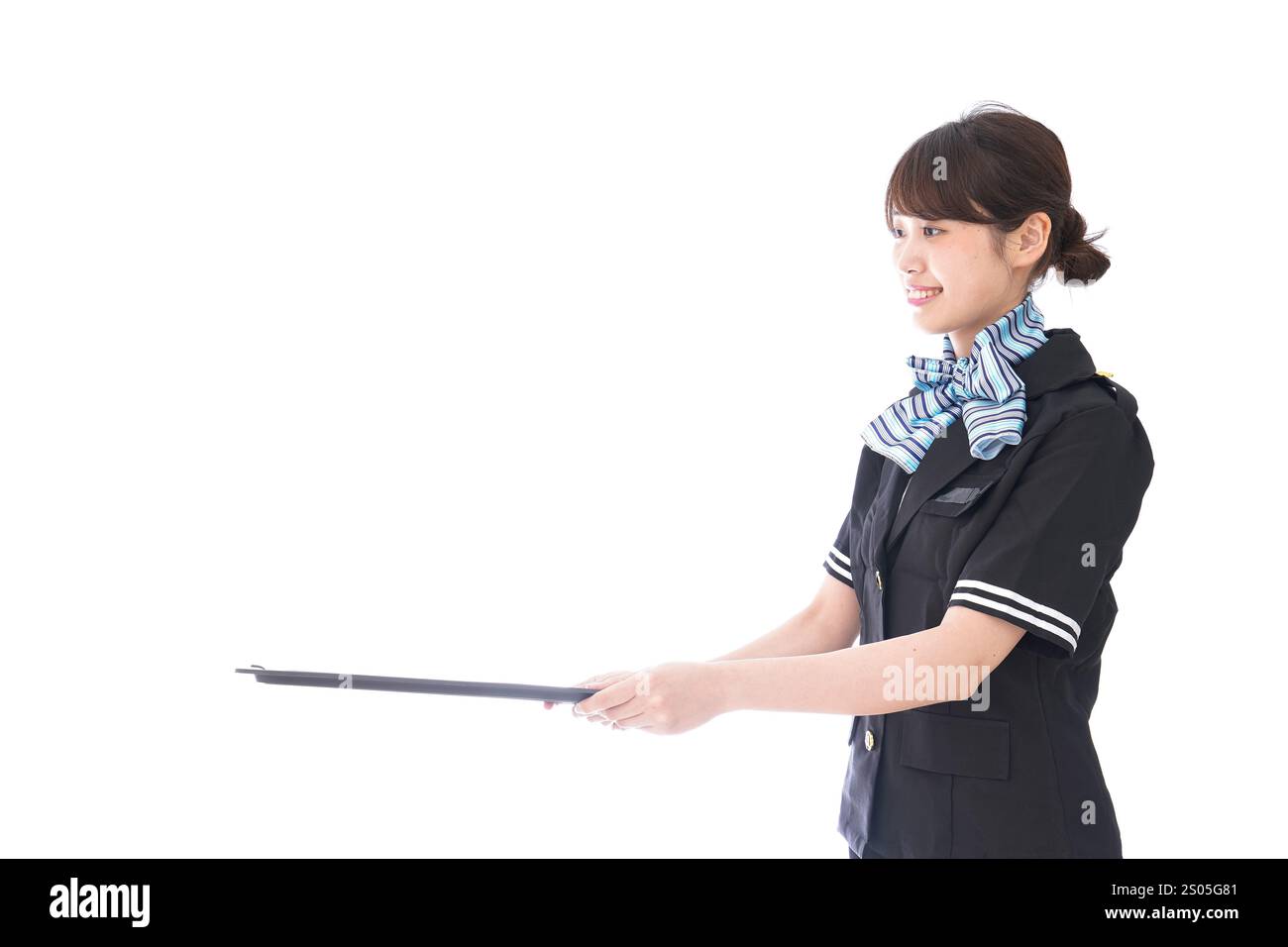 Cabin attendants performing in-flight service Stock Photo - Alamy