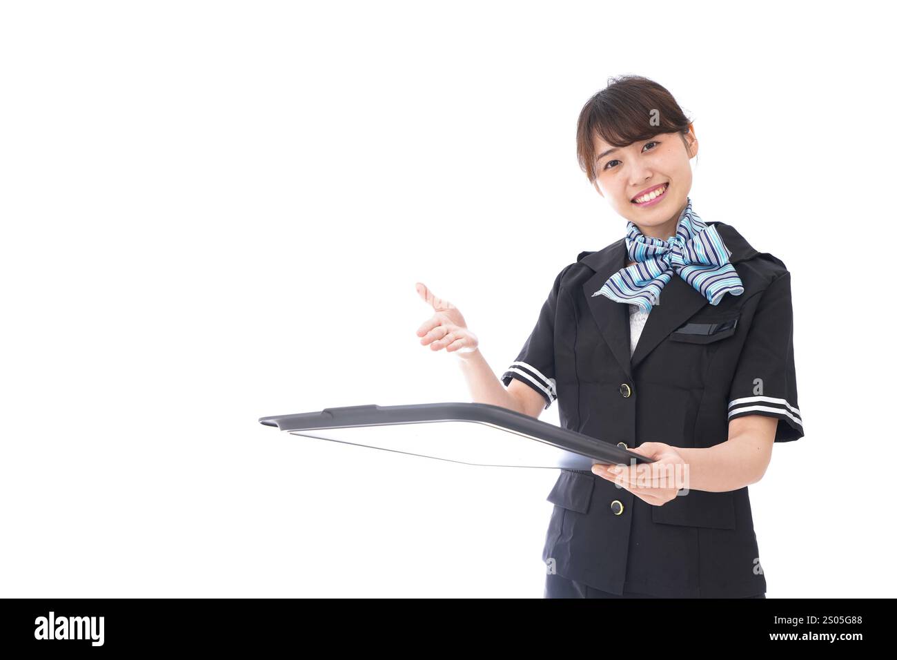 Cabin attendants performing in-flight service Stock Photo - Alamy