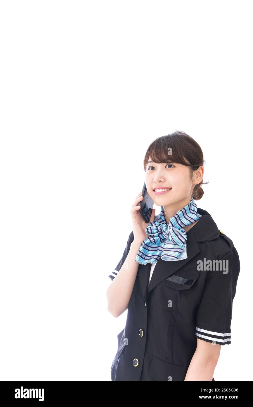 Cabin attendant making a phone call Stock Photo - Alamy