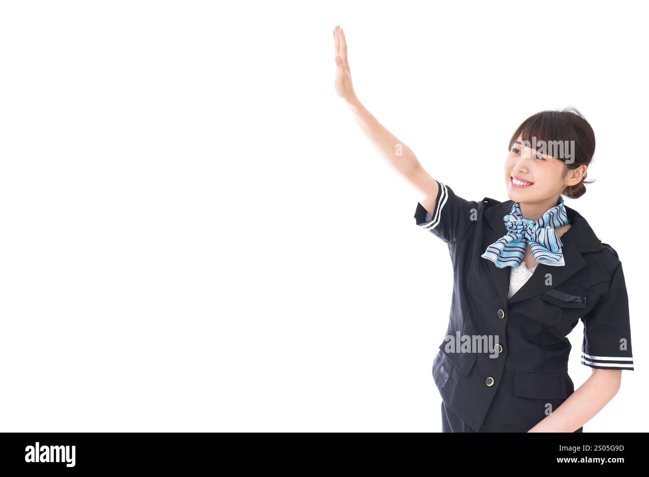 Cabin attendant seeing someone off Stock Photo - Alamy