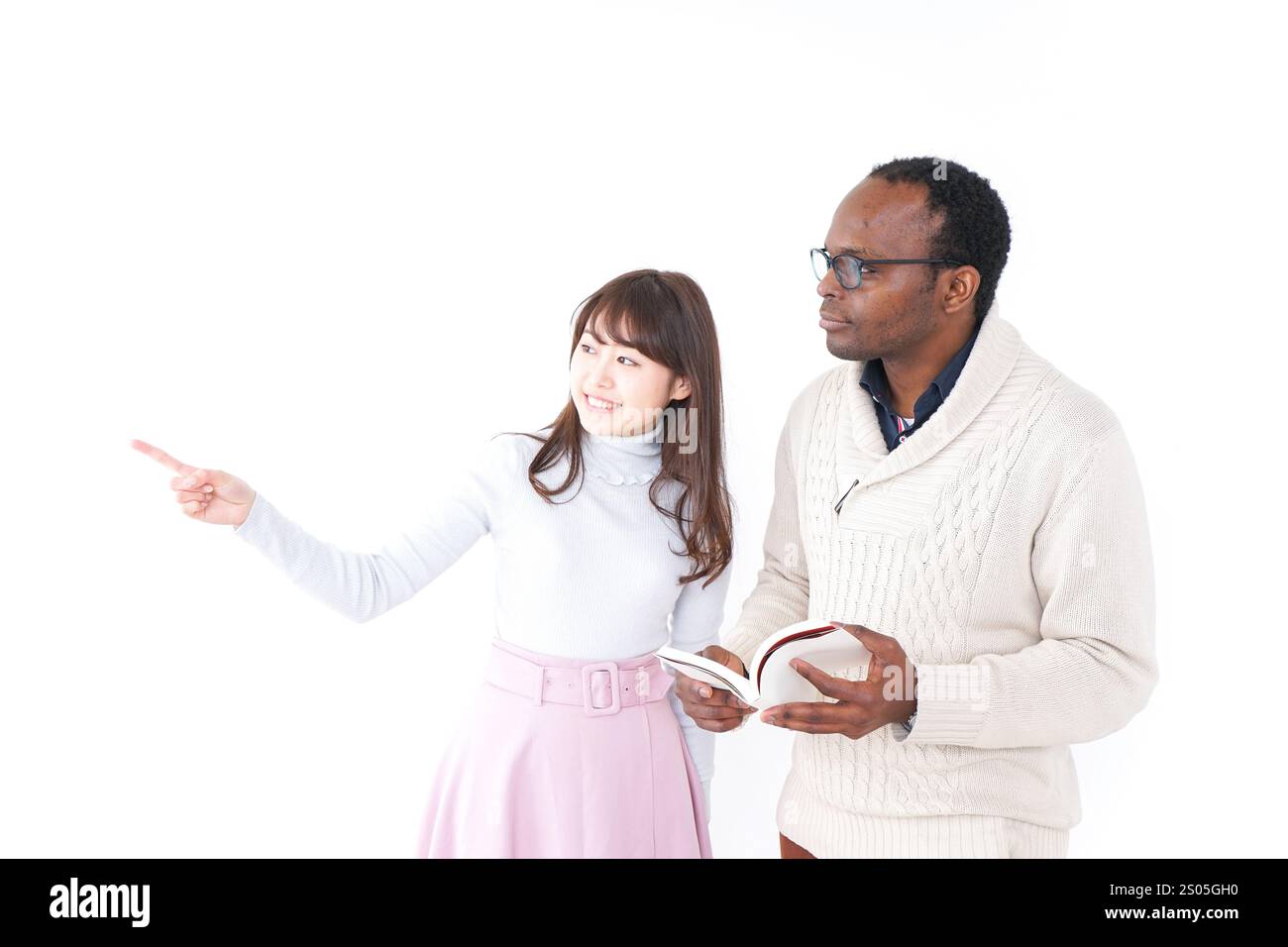 Woman giving directions on the road Stock Photo - Alamy