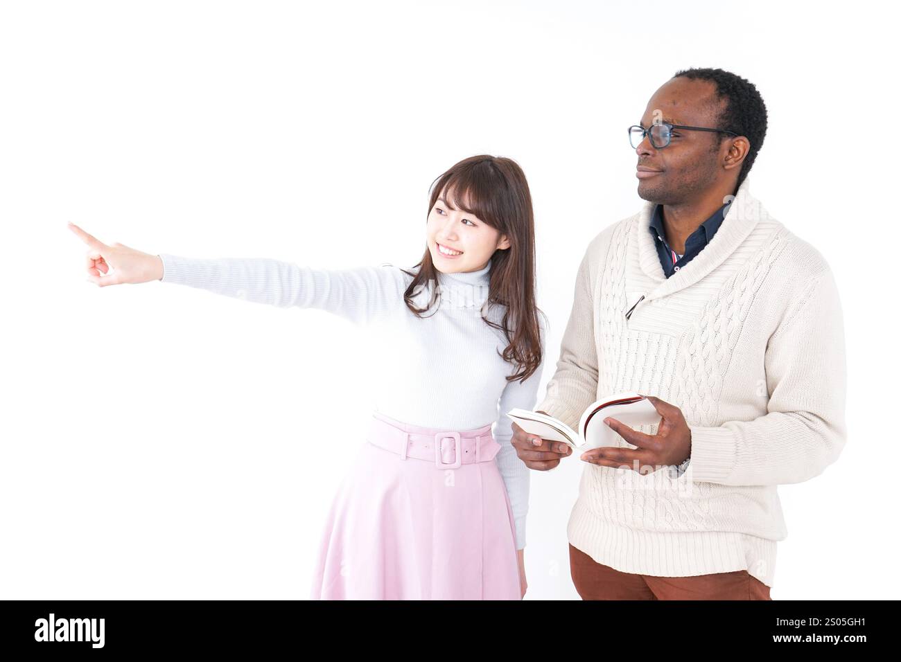 Woman giving directions on the road Stock Photo - Alamy