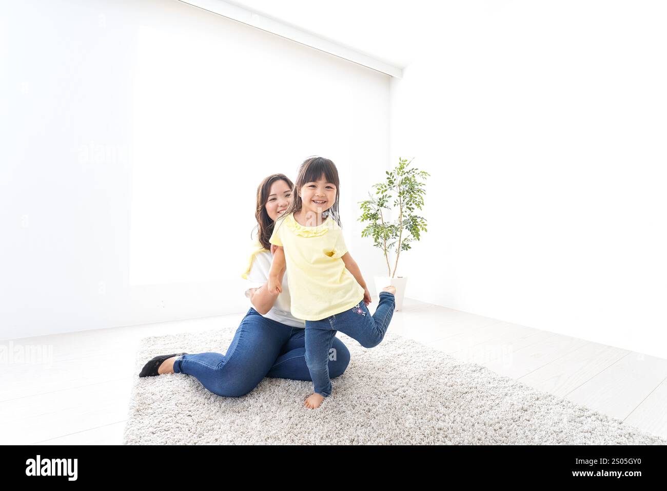 Mother and children Stock Photo - Alamy