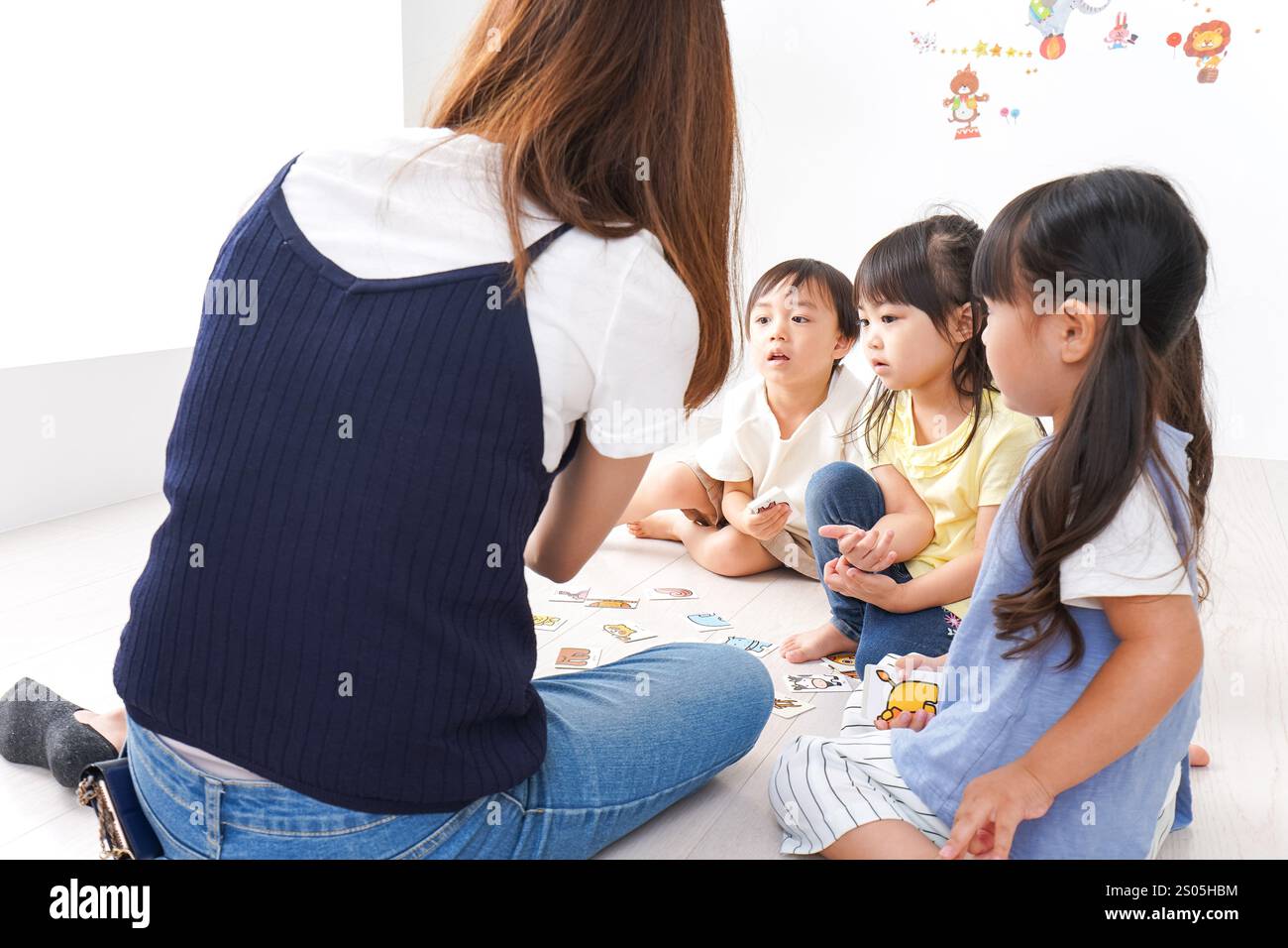 reading a story to a child Stock Photo - Alamy