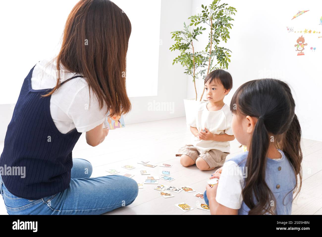 reading a story to a child Stock Photo - Alamy