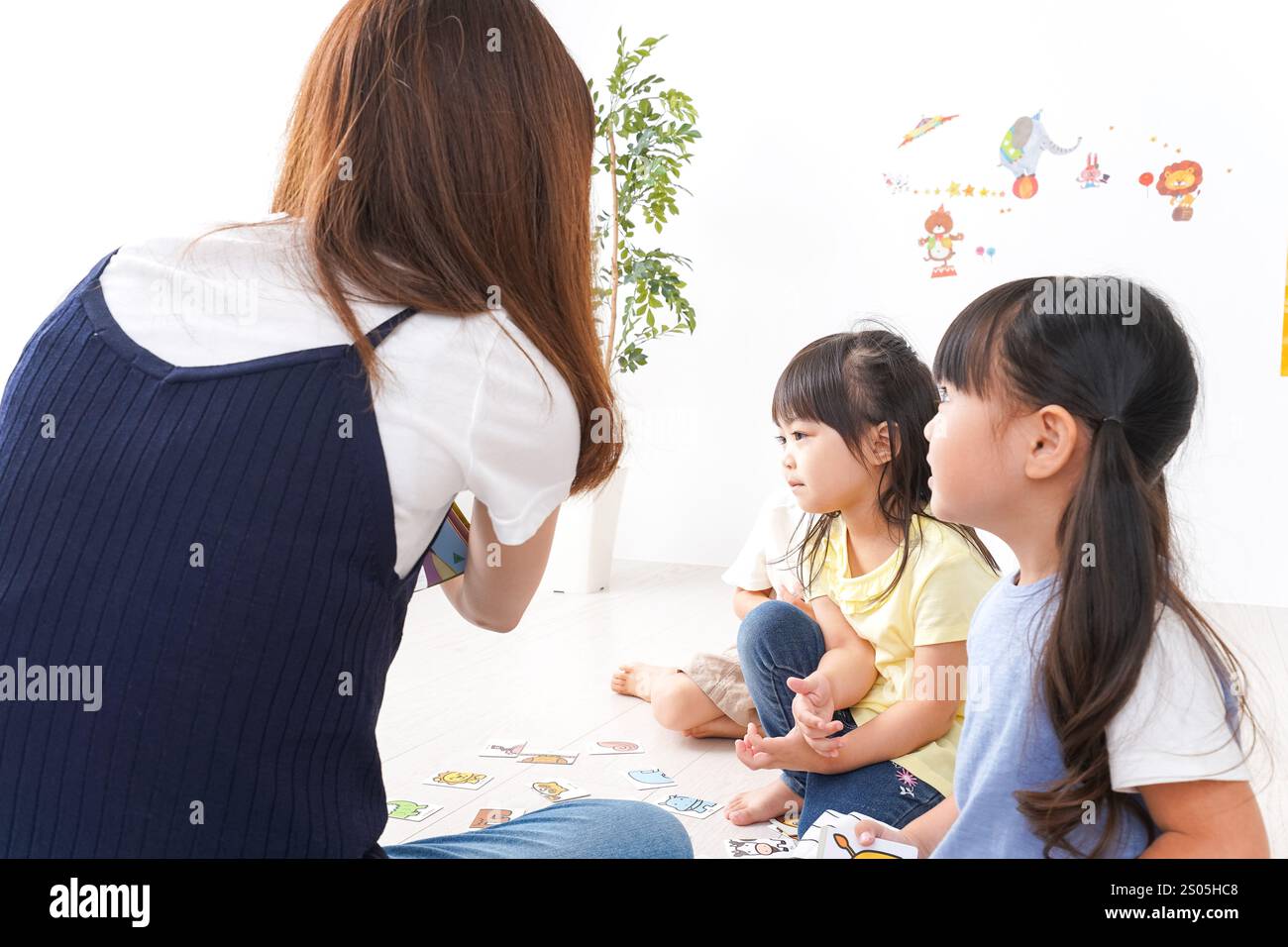 reading a story to a child Stock Photo - Alamy