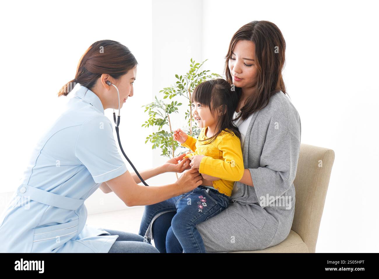 Child being examined at hospital Stock Photo - Alamy