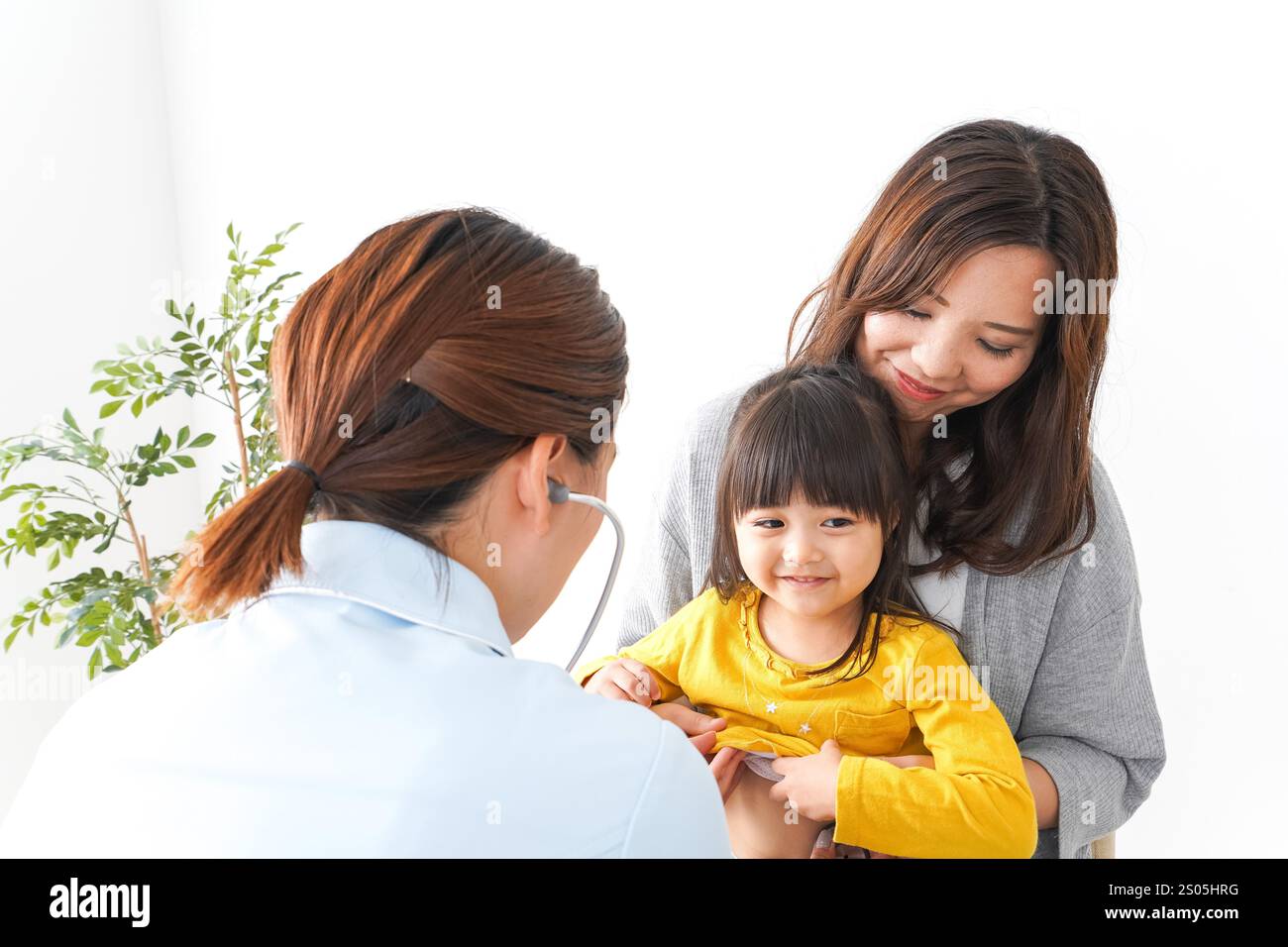 Child being examined at hospital Stock Photo - Alamy