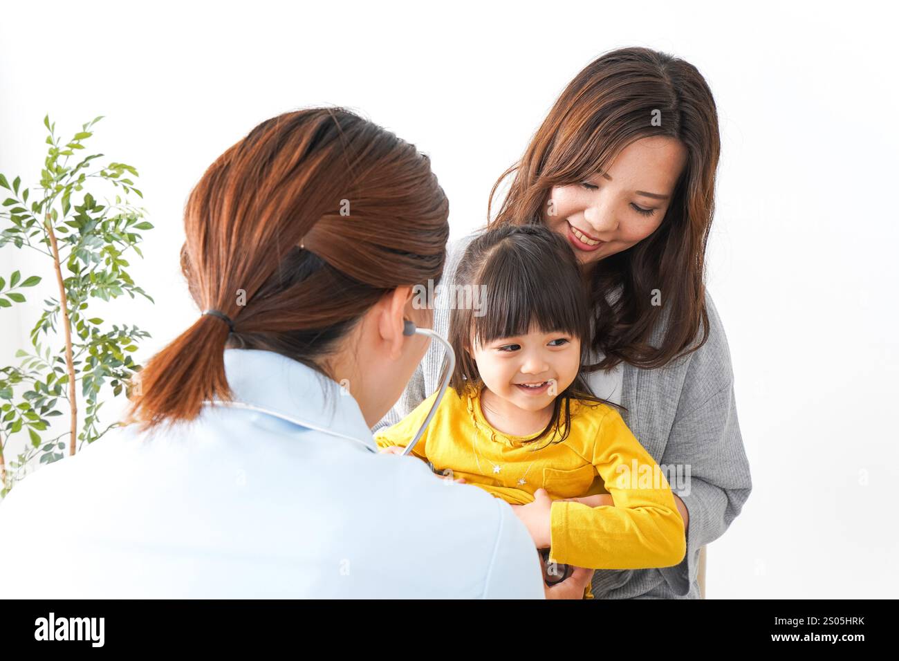 Child being examined at hospital Stock Photo - Alamy