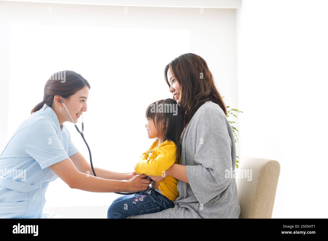 Child being examined at hospital Stock Photo - Alamy