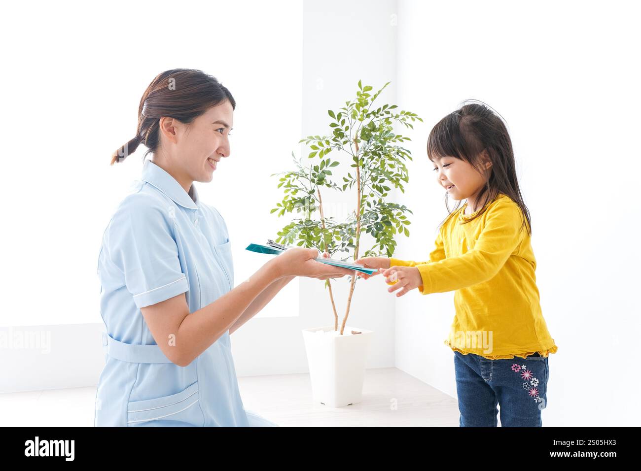 Child being examined at hospital Stock Photo - Alamy