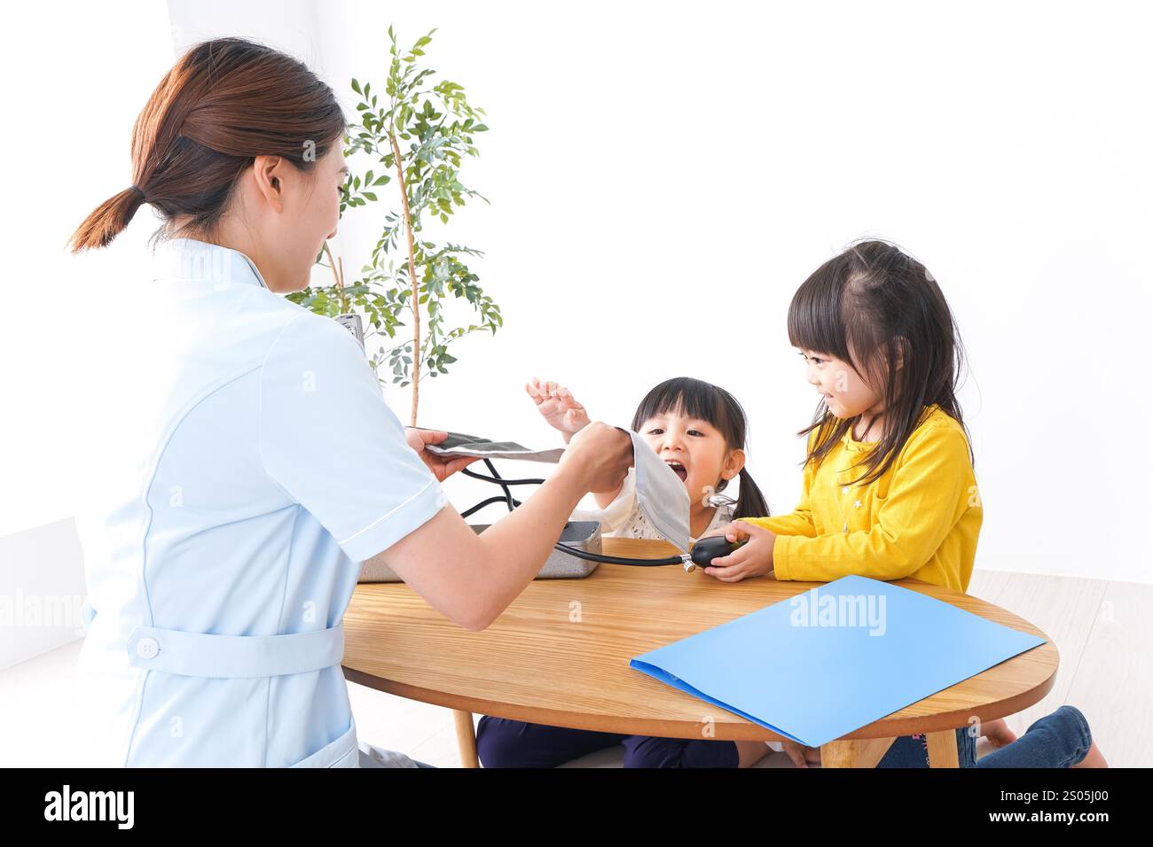 Nurses and children Stock Photo - Alamy
