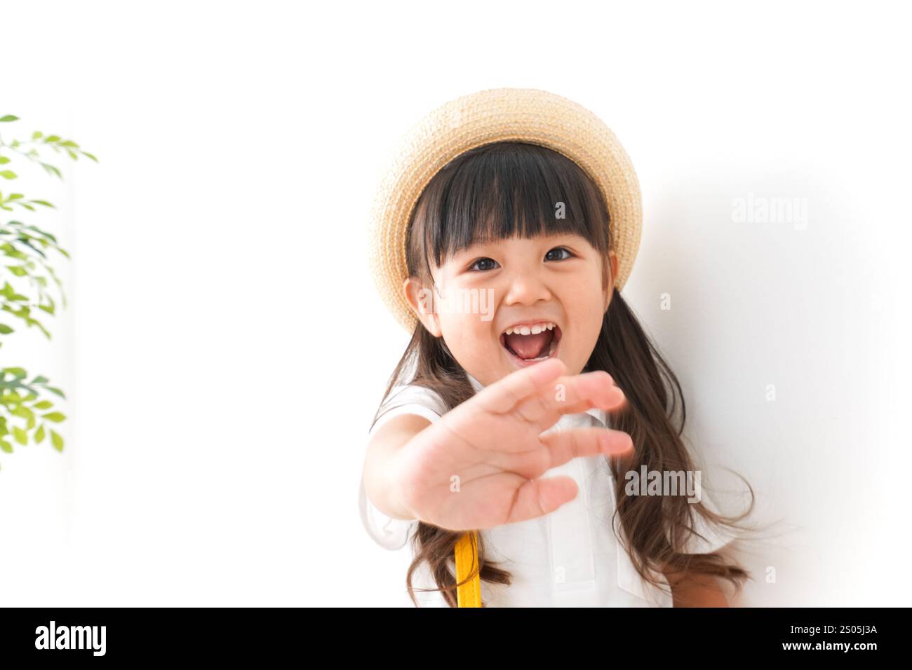 Kindergarten children wearing hats Stock Photo - Alamy