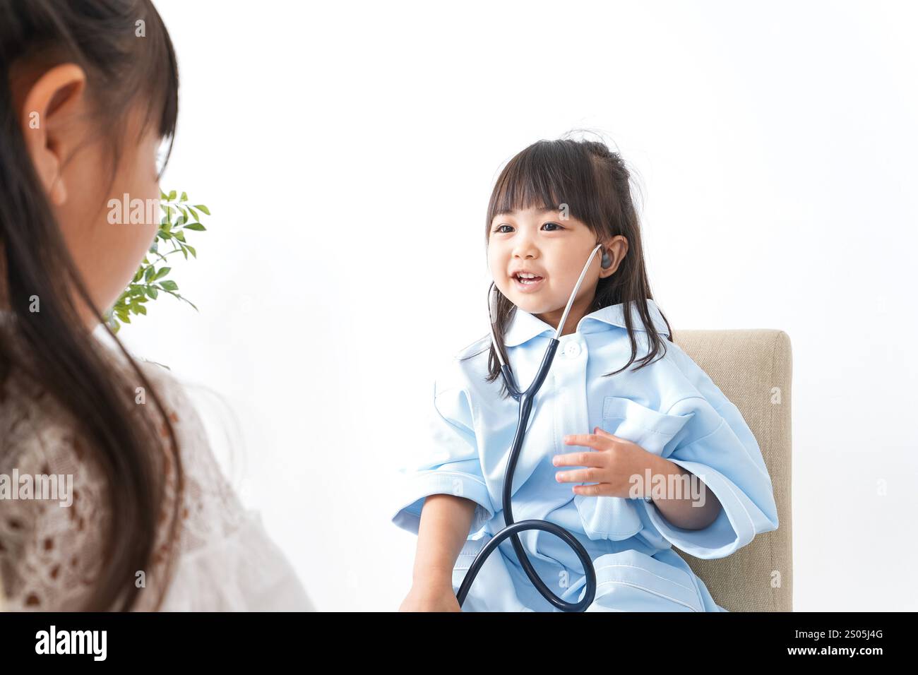 Child playing doctor Stock Photo - Alamy