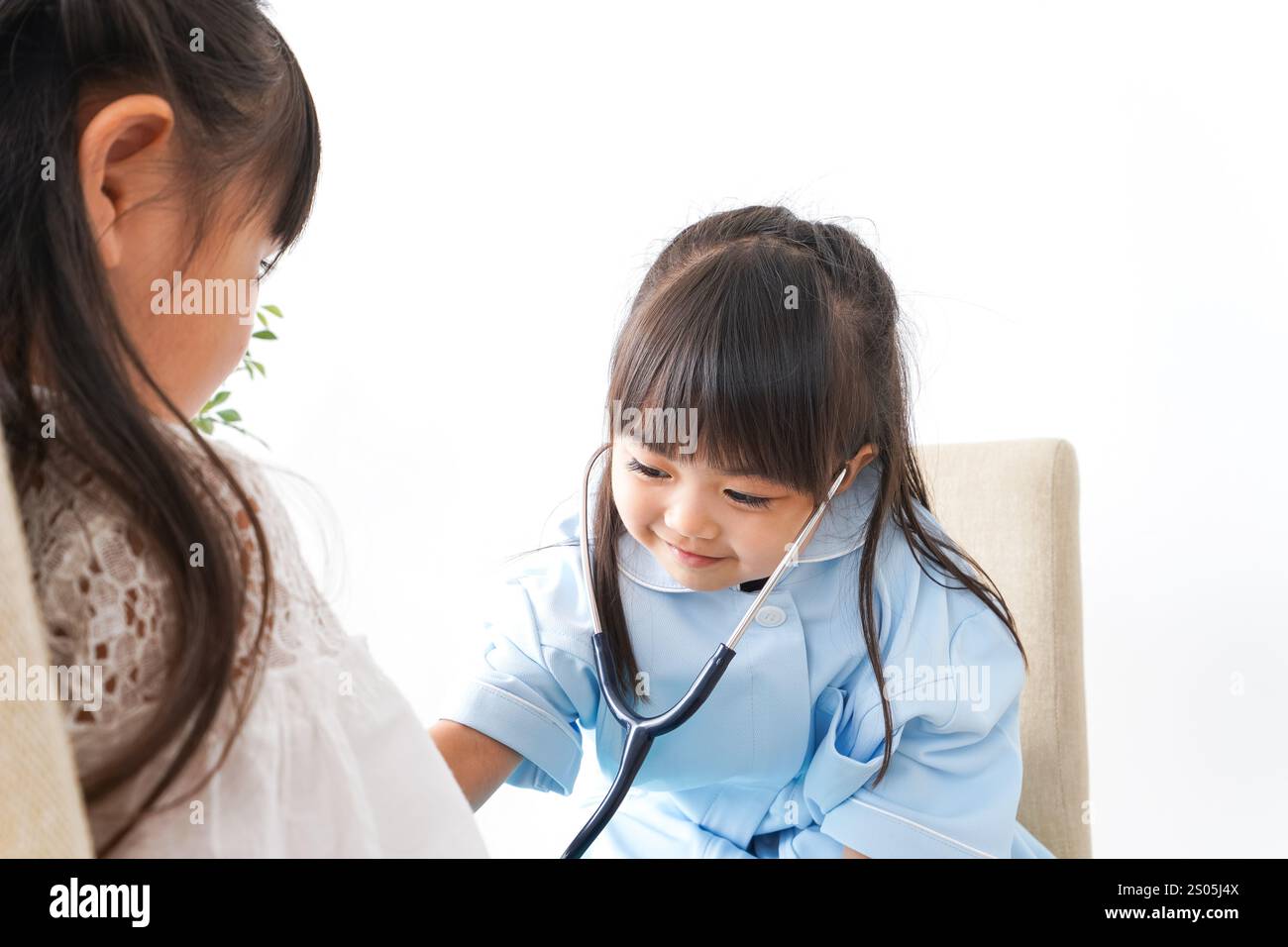 Children playing doctor hi-res stock photography and images - Alamy