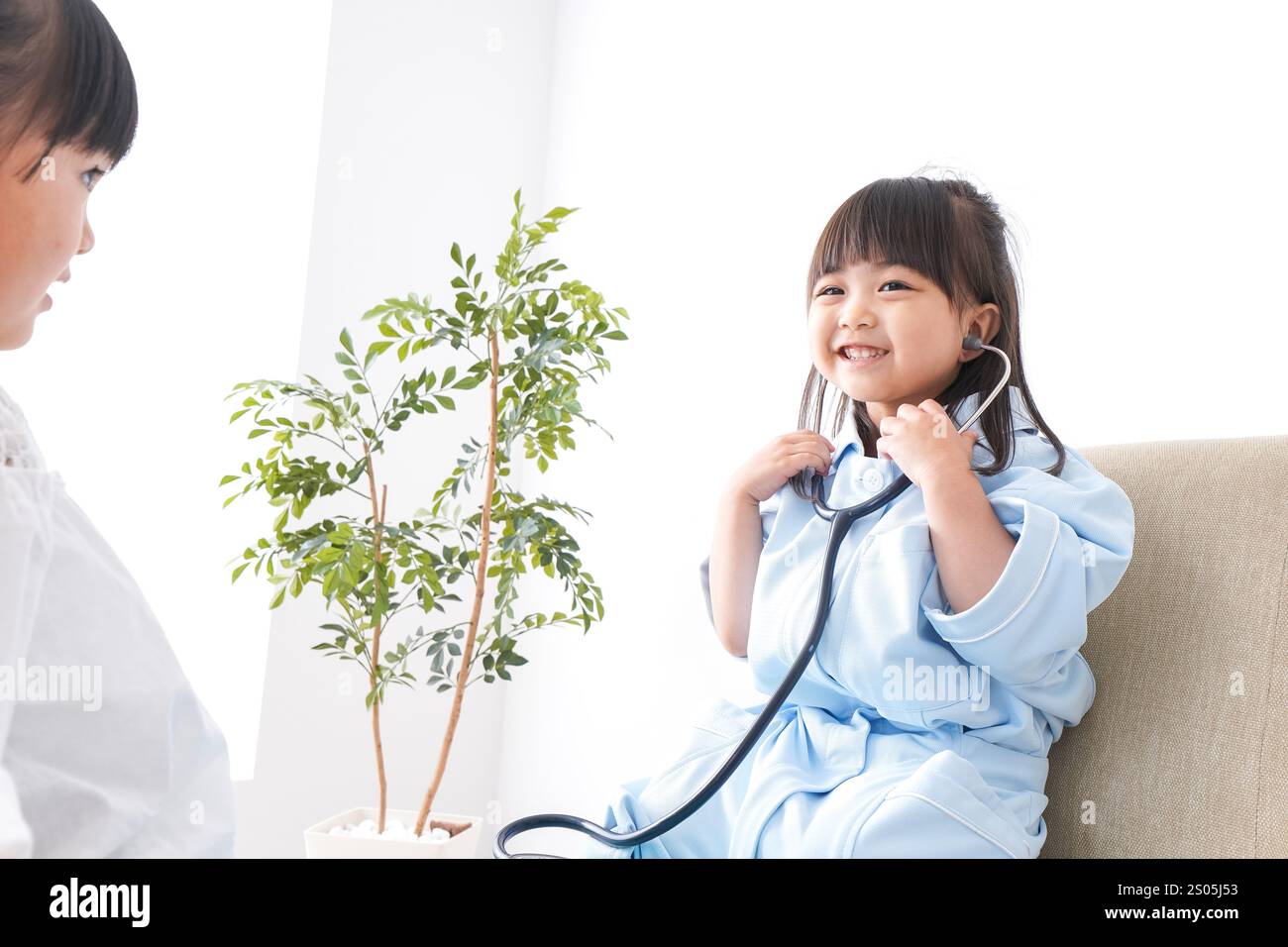 Doctor children game kindergarten hi-res stock photography and images ...