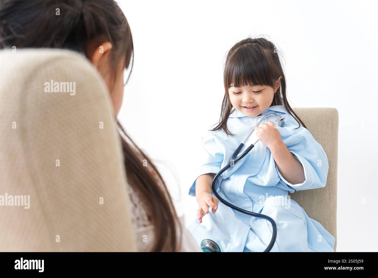 Doctor children game kindergarten hi-res stock photography and images ...